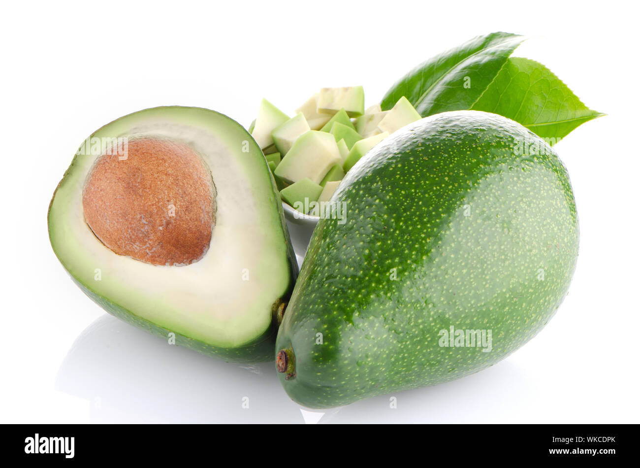 Avocado fruits on white background Stock Photo - Alamy