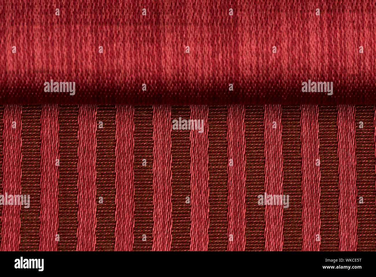 Closeup detail of red fabric texture background Stock Photo - Alamy