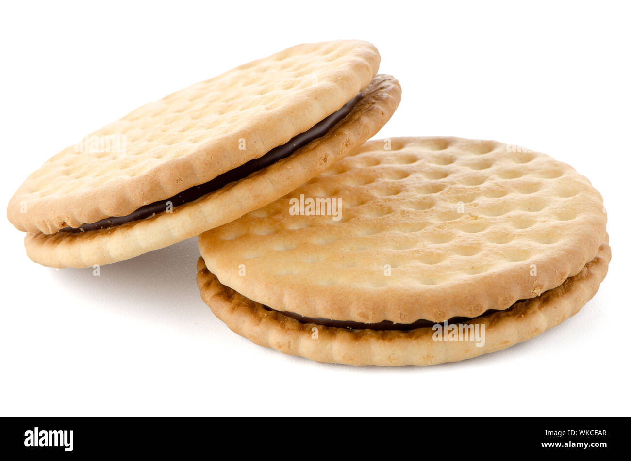 Sandwich biscuits with chocolate filling on a white background Stock ...