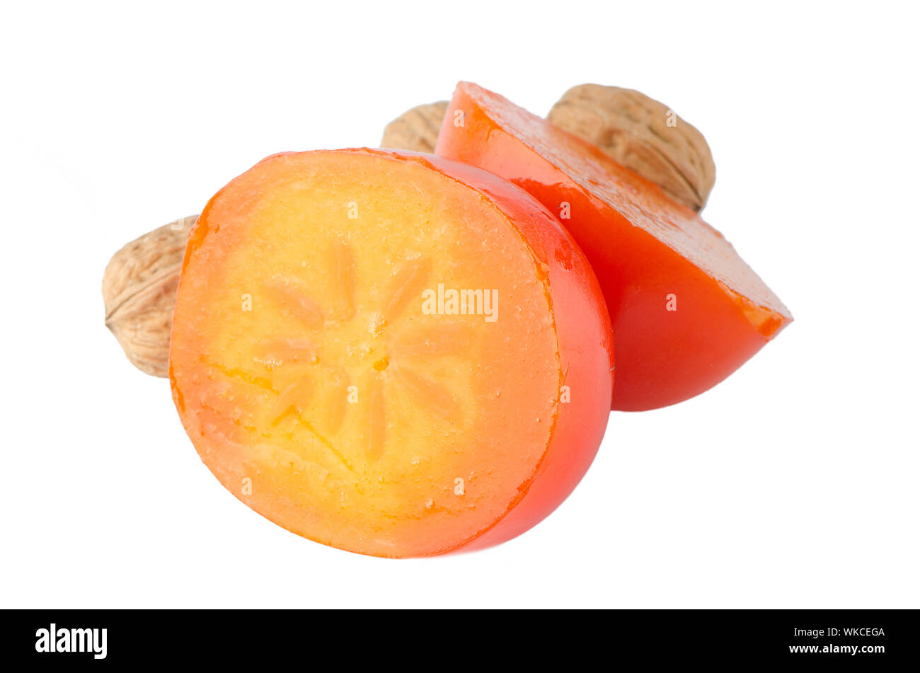 Persimmon. Ripe persimmon with slice isolated on white background Stock ...