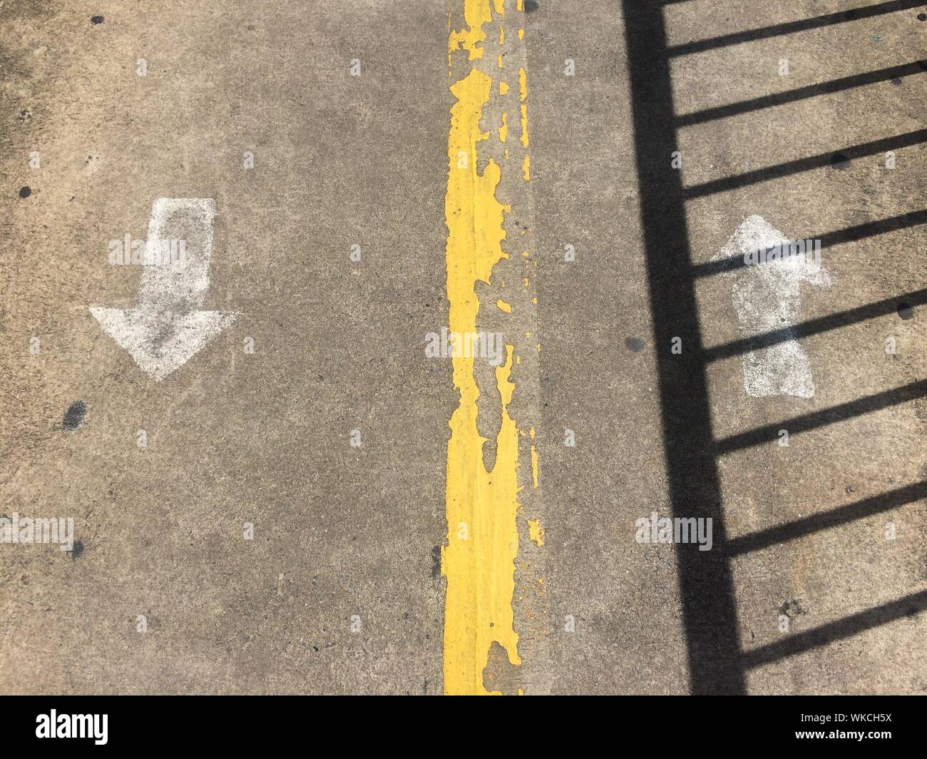 Directional road markings hi-res stock photography and images - Alamy