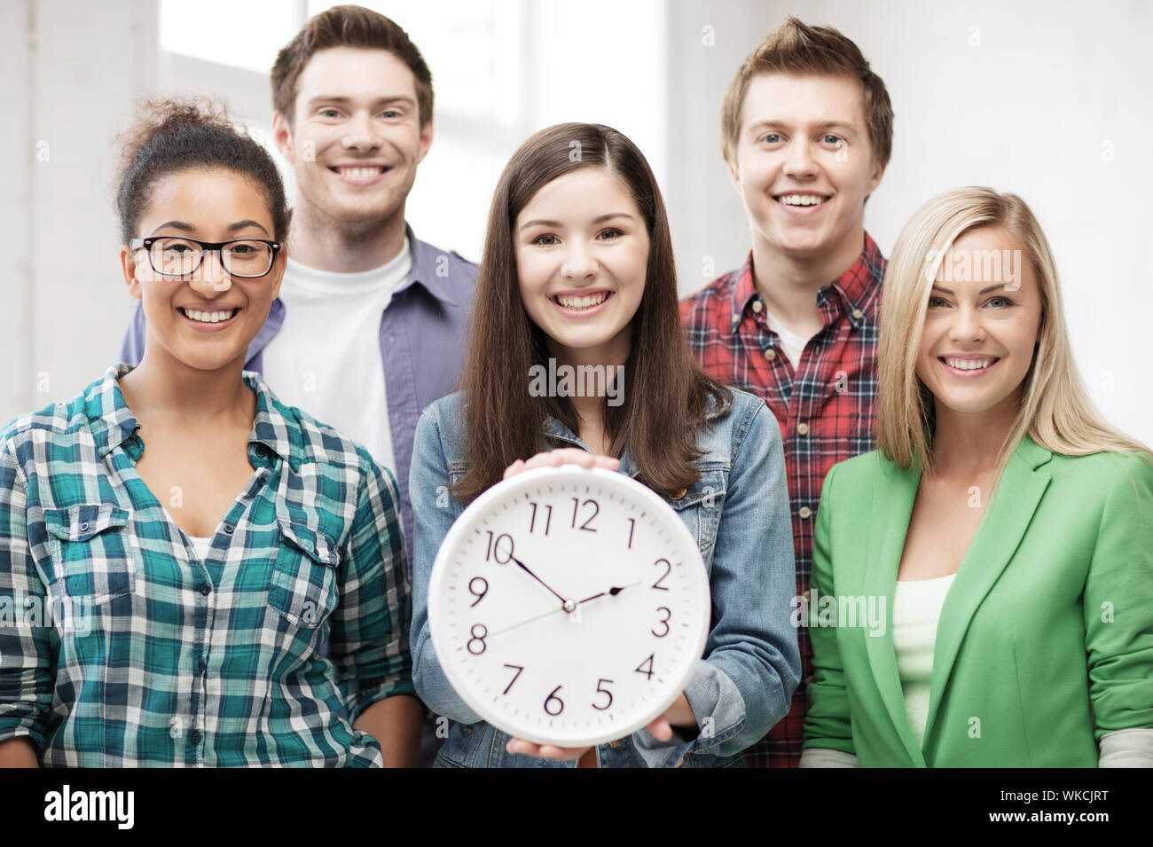 group of students at school with clock Stock Photo - Alamy