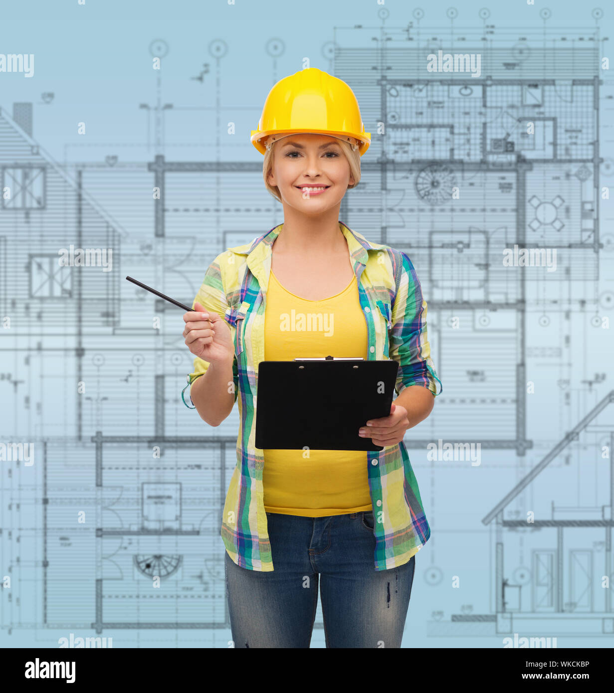 repair, construction and maintenance concept - smiling woman in helmet ...