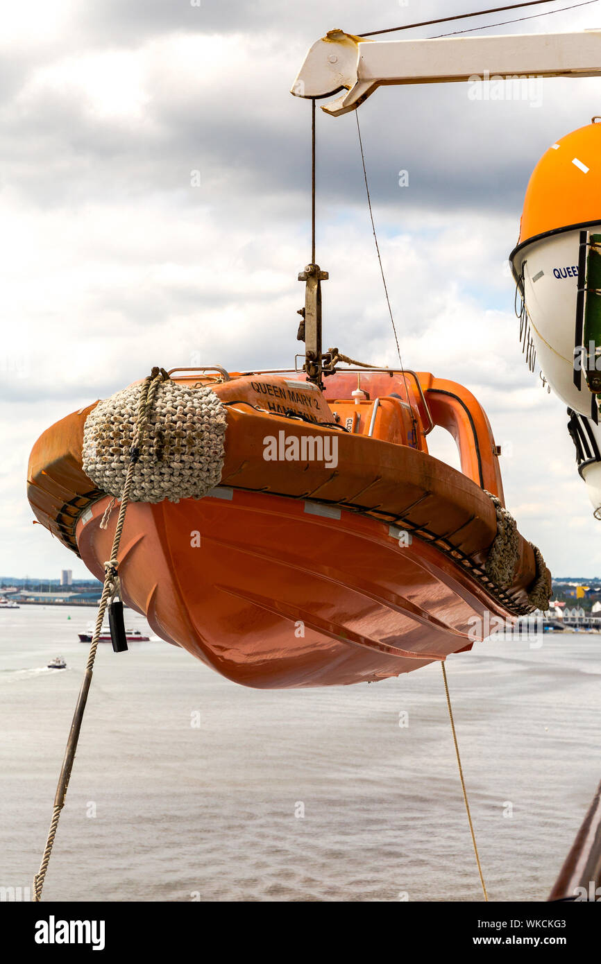 Ribbed fast rescue craft on Queen Mary 2 qm2 sitting on davits Stock ...