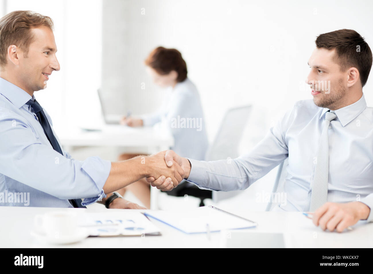 picture of businessmen shaking hands in office Stock Photo - Alamy