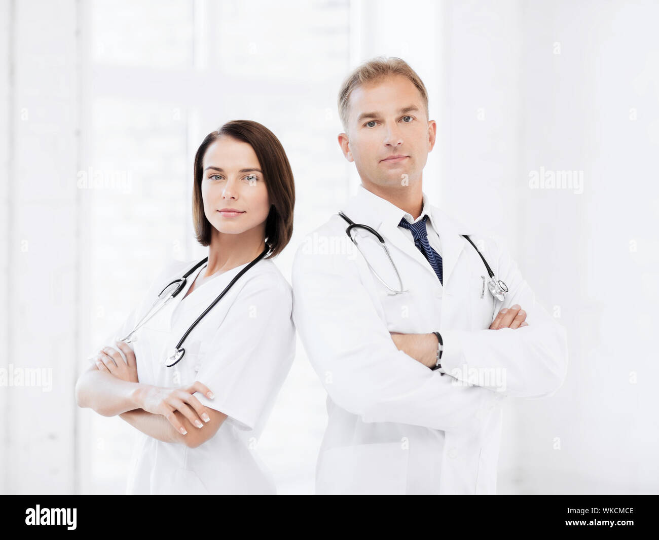 two doctors with stethoscopes Stock Photo - Alamy