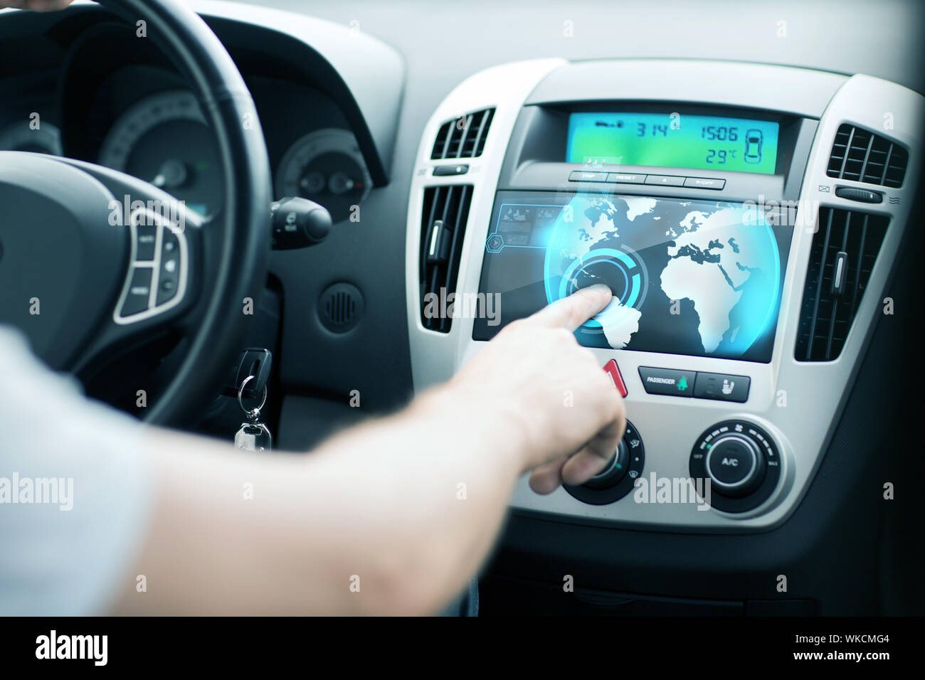 transportation and vehicle concept - man using car control panel Stock ...