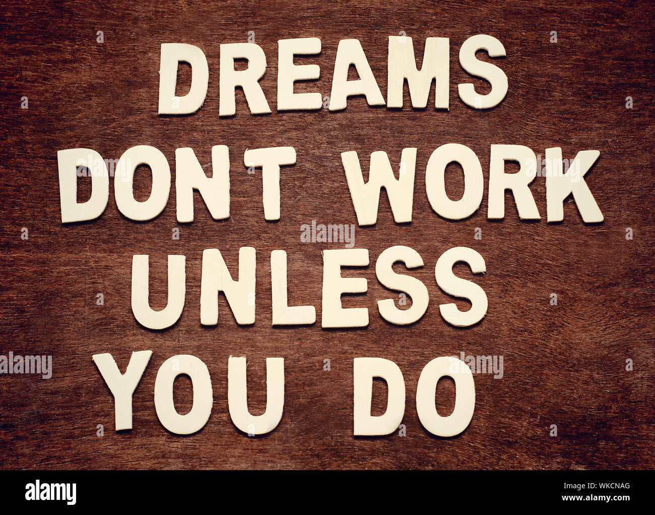 Inspirational motivating quote in wooden letters Stock Photo - Alamy