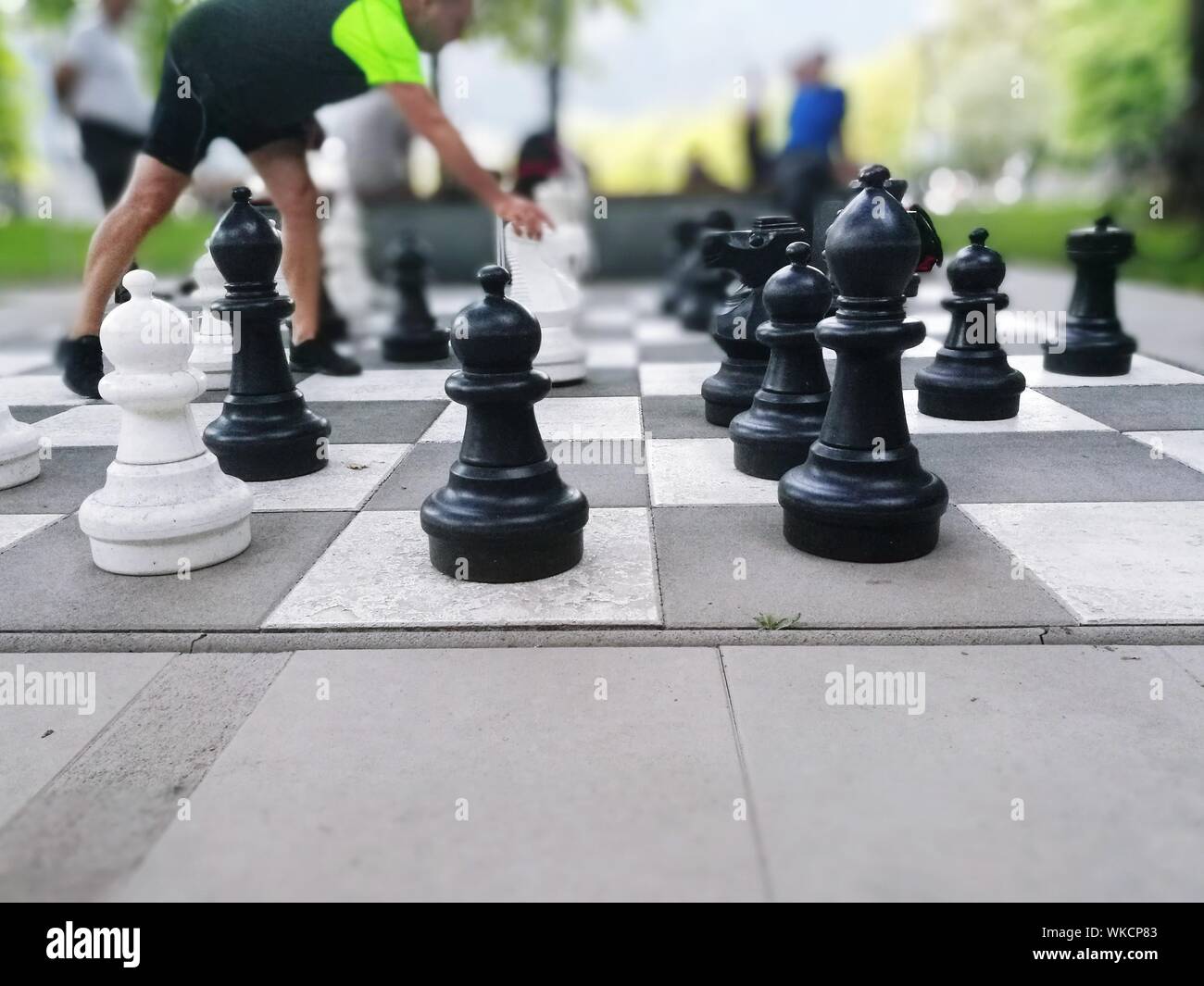 People playing chess park hi-res stock photography and images - Alamy