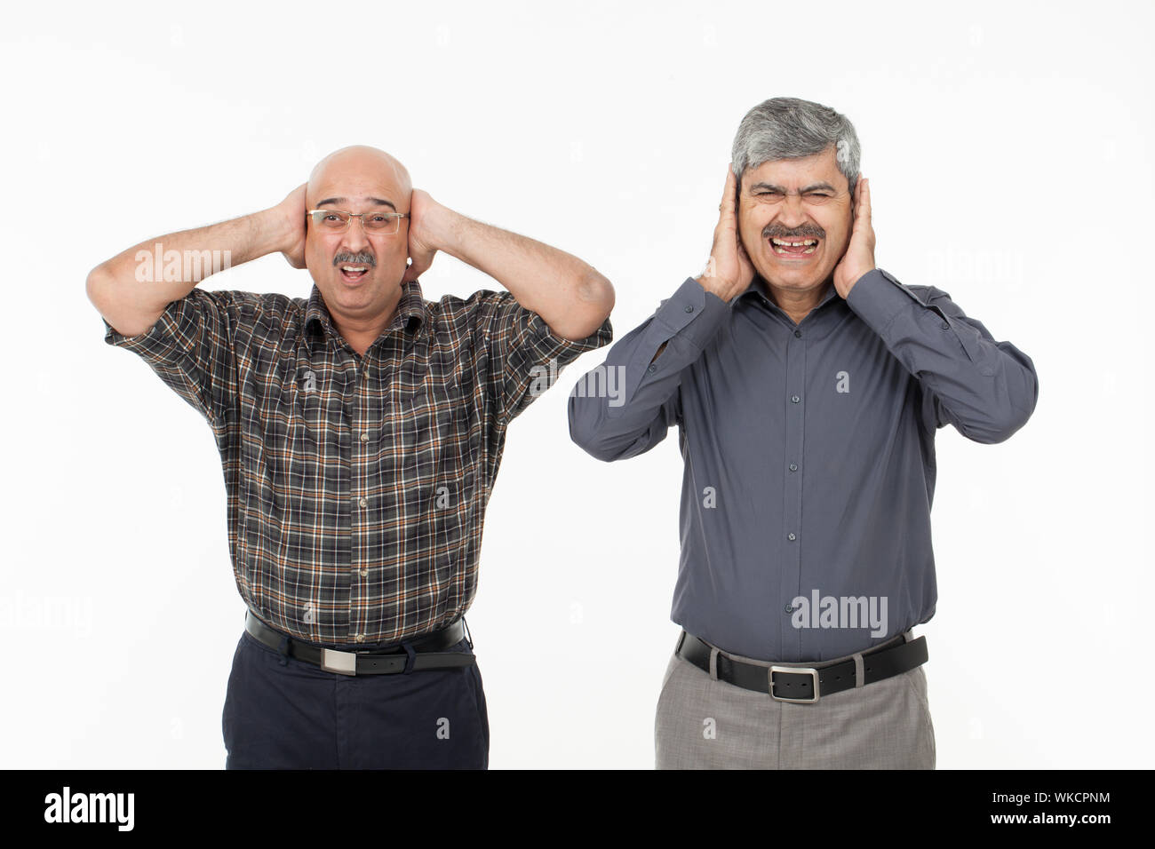 Hands covering ears hi-res stock photography and images - Alamy