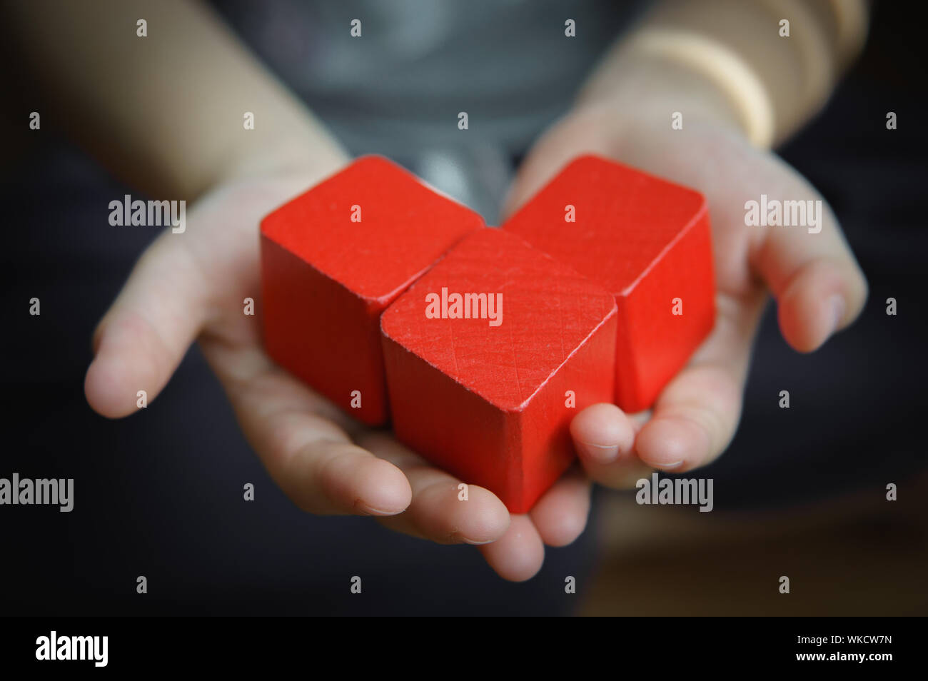 Children hands blocks hi-res stock photography and images - Alamy