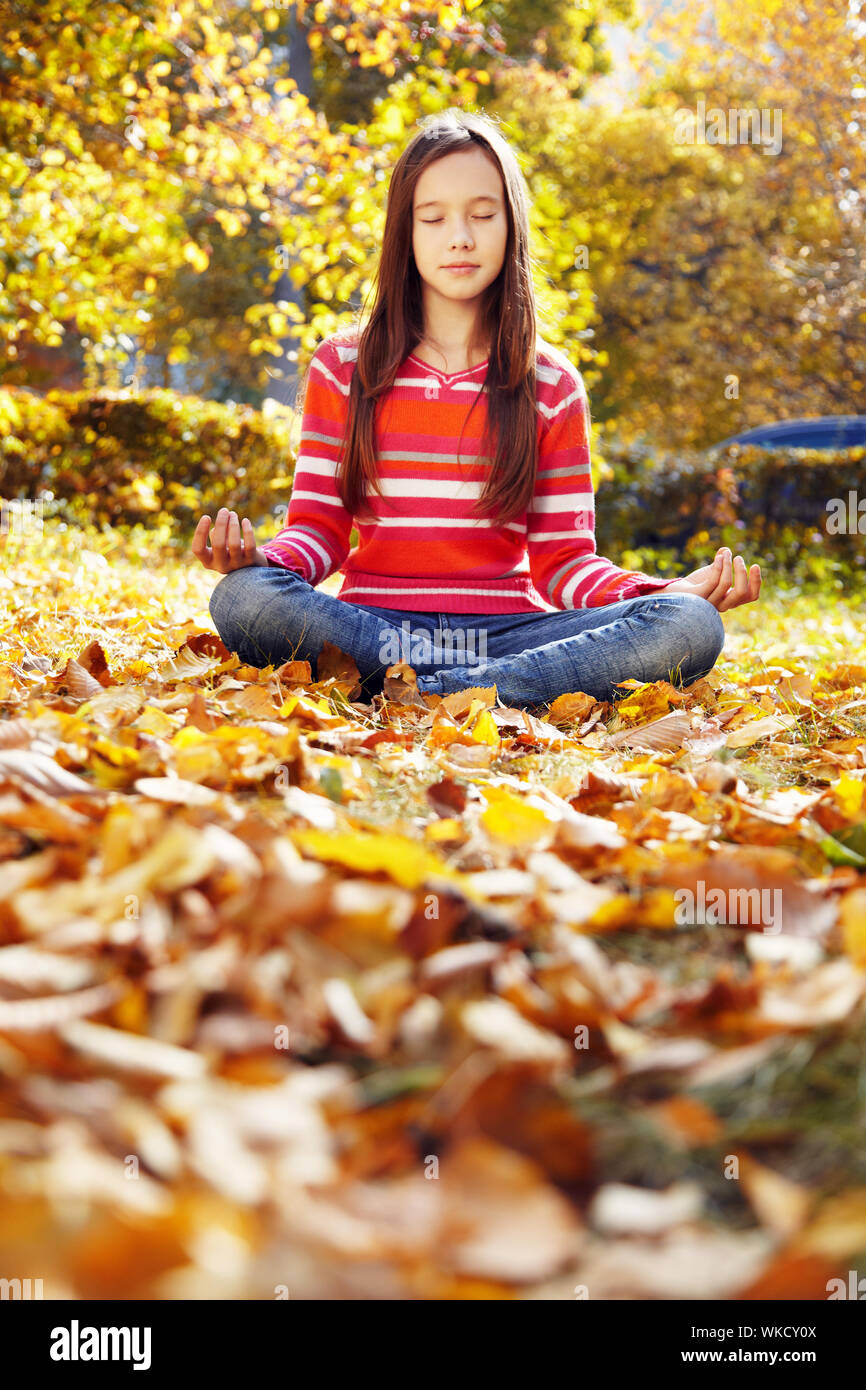 Portrait teenager meditating hi-res stock photography and images - Alamy