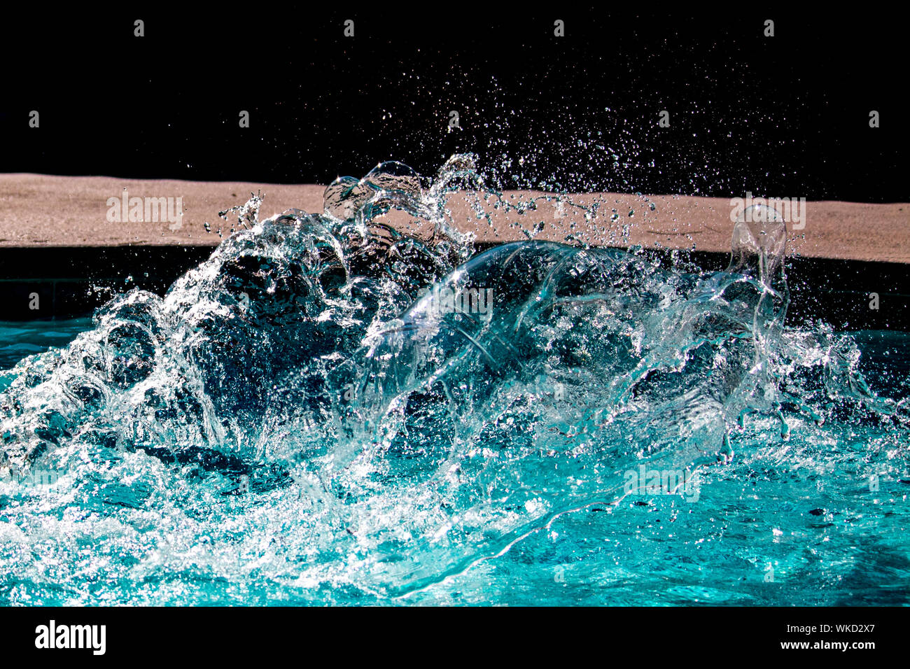 Water Splashing At Swimming Pool Stock Photo - Alamy