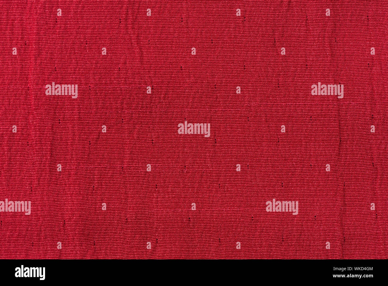 Closeup detail of red fabric texture background Stock Photo - Alamy