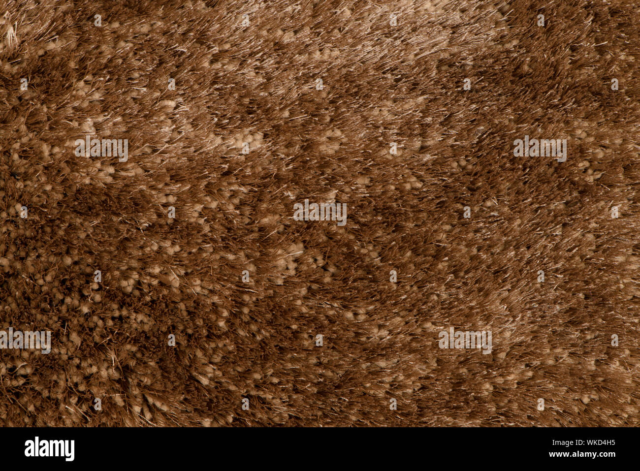 Closeup detail of brown carpet texture background Stock Photo - Alamy
