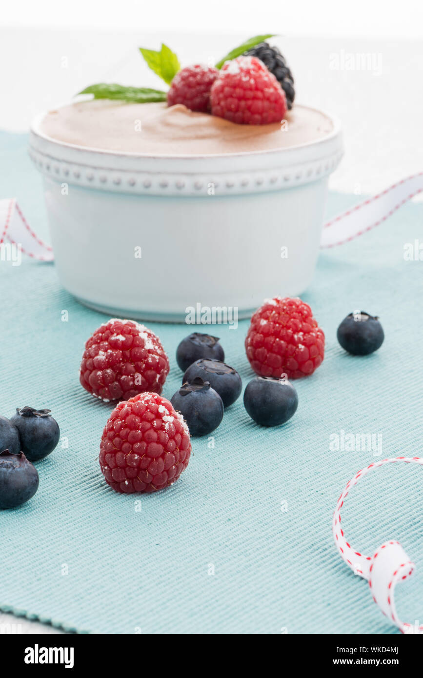Chocolate mousse and red fruits Stock Photo - Alamy