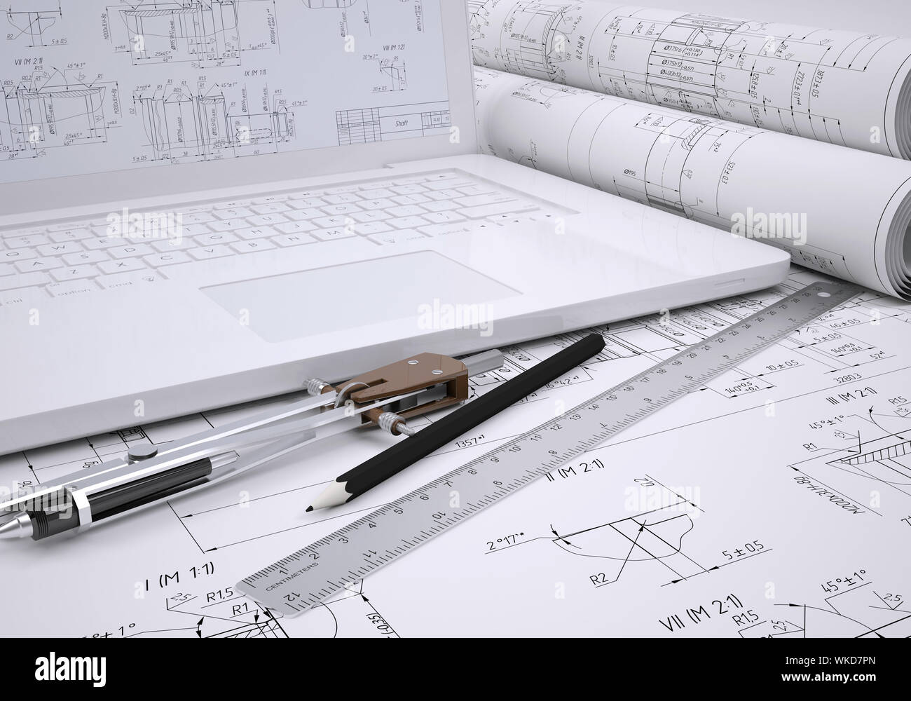 Scrolls engineering drawings and laptop. Desk Engineer Stock Photo - Alamy