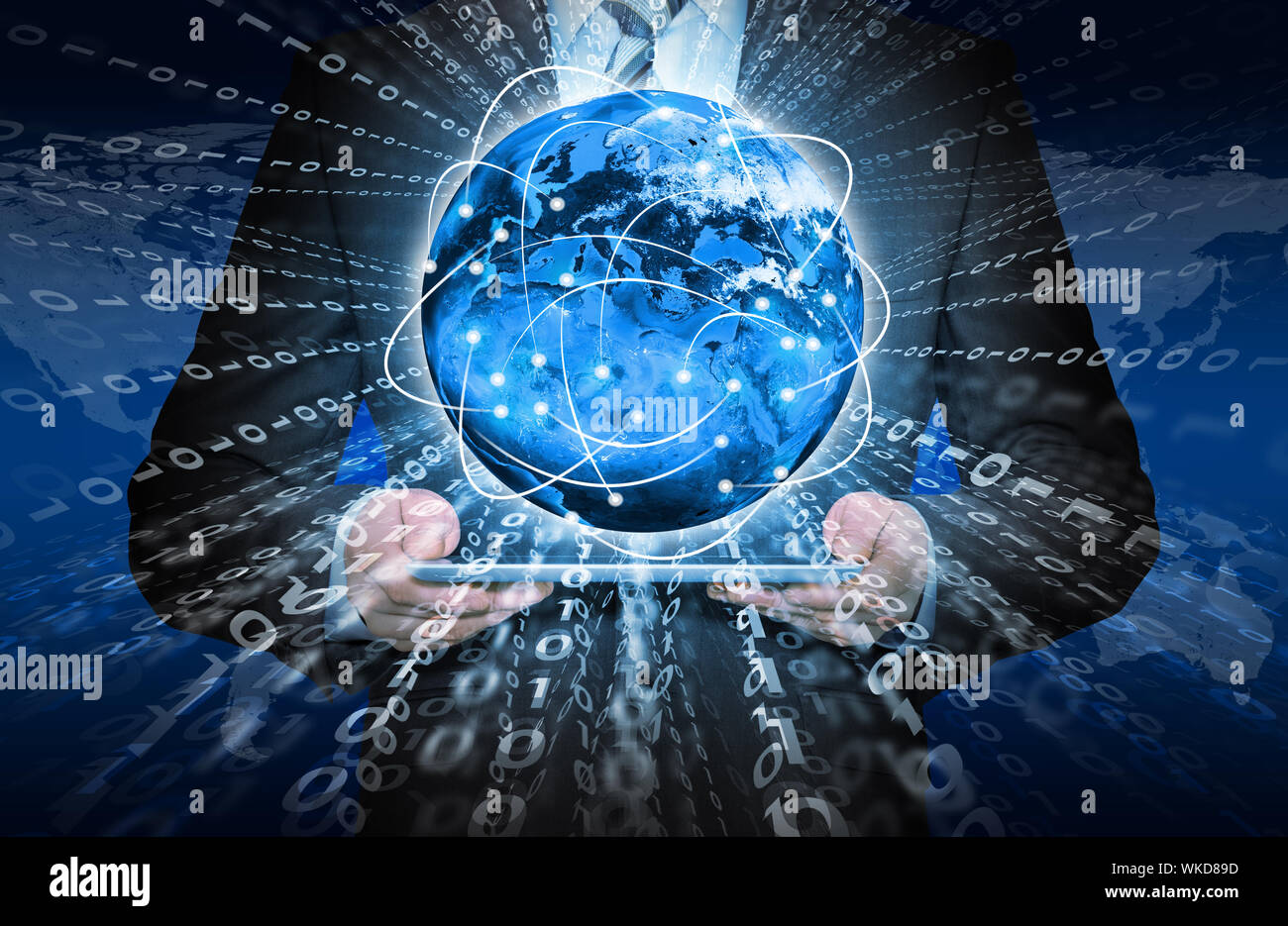 Businessman holding tablet in his hands. Glowing figures and Earth ...