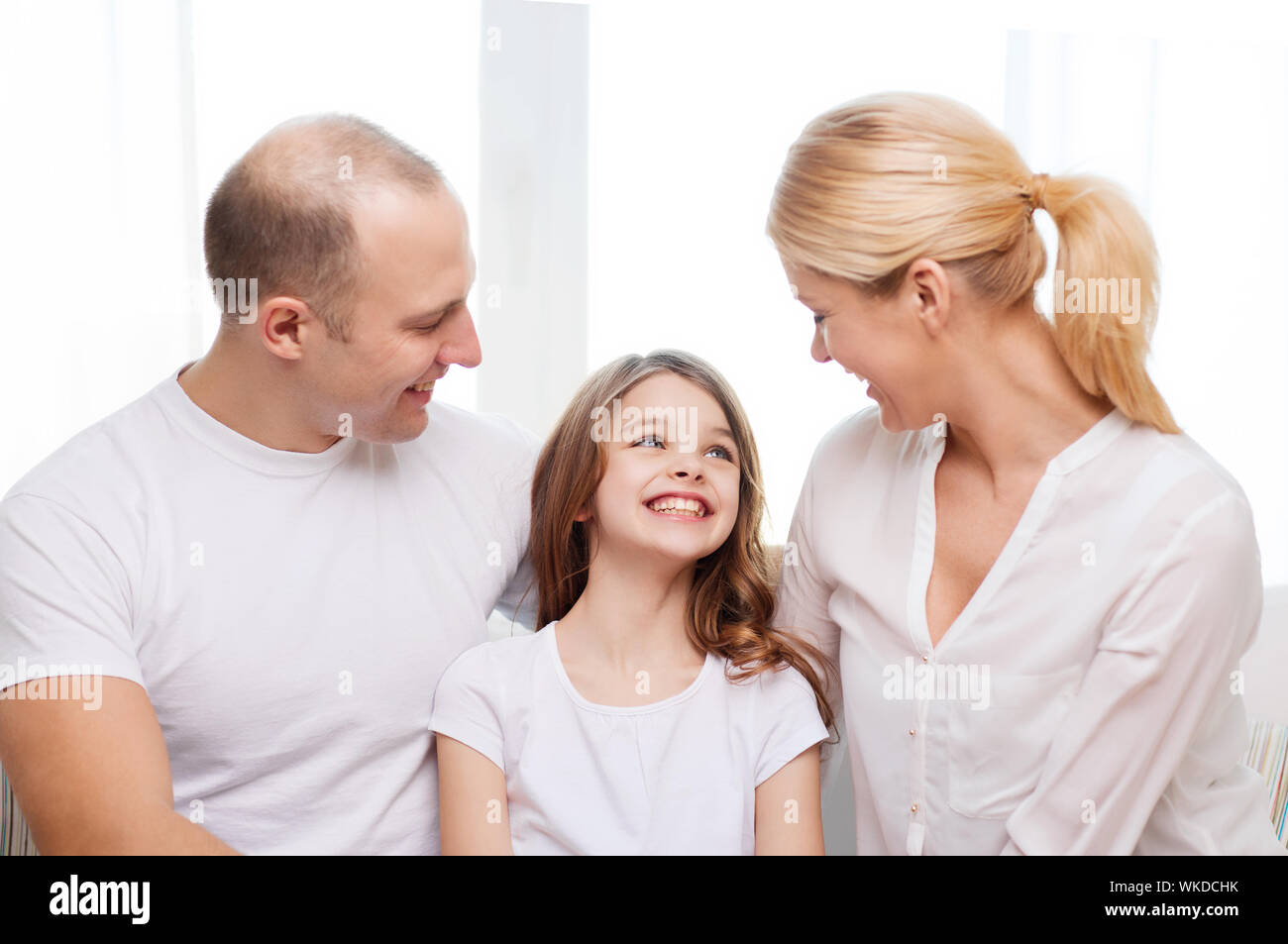 Teen girl talking with parents hi-res stock photography and images - Alamy