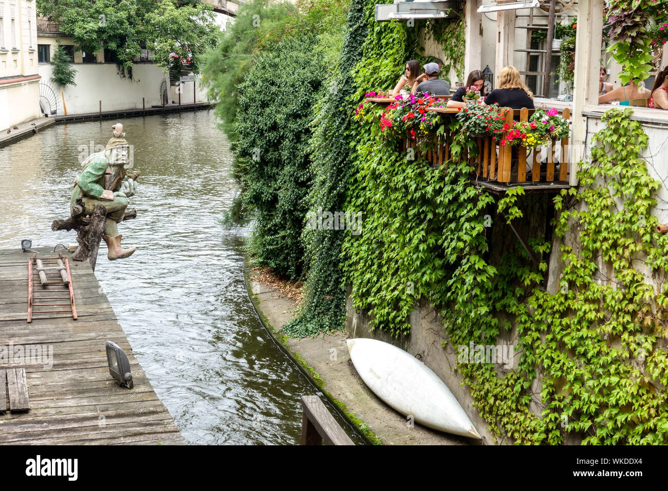 Prague Certovka Prague canal, tourists on terrace restaurant above ...