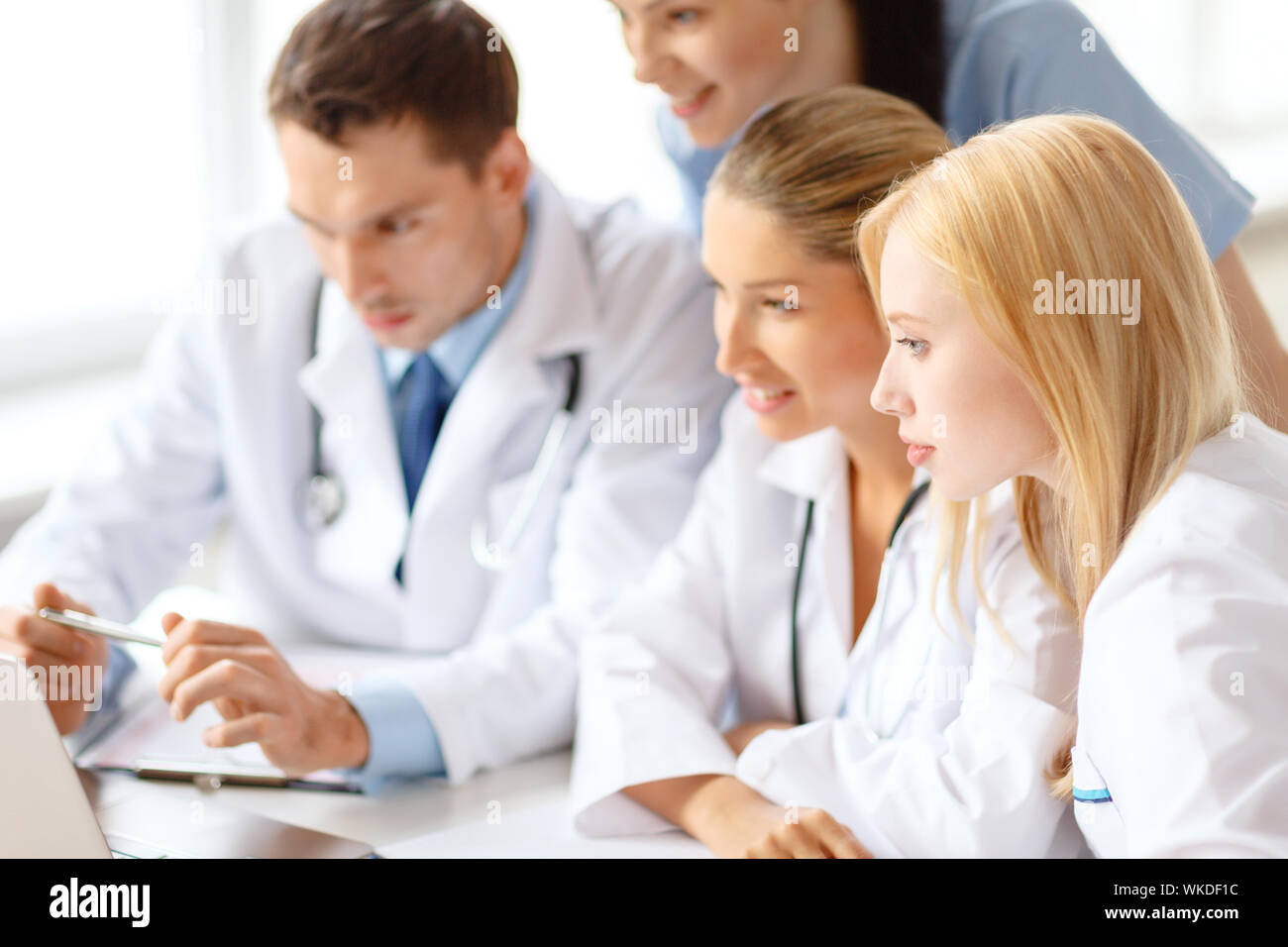 healthcare, medical and technology concept - smiling group of doctors ...