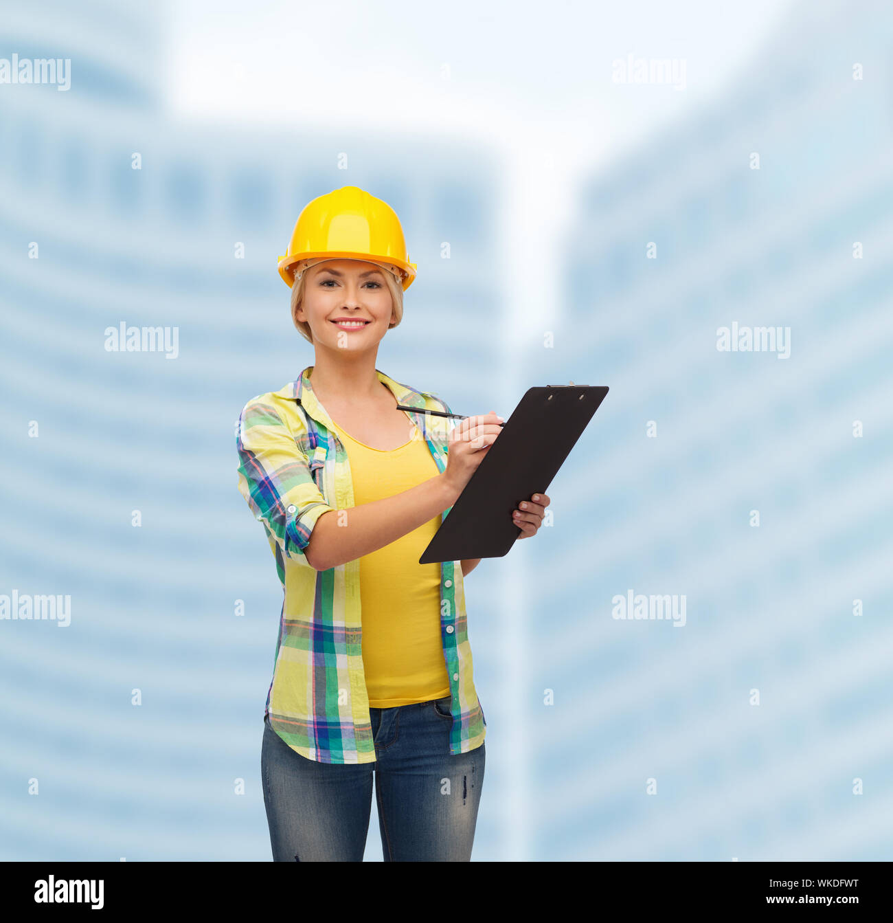 repair, construction and maintenance concept - smiling woman in helmet ...