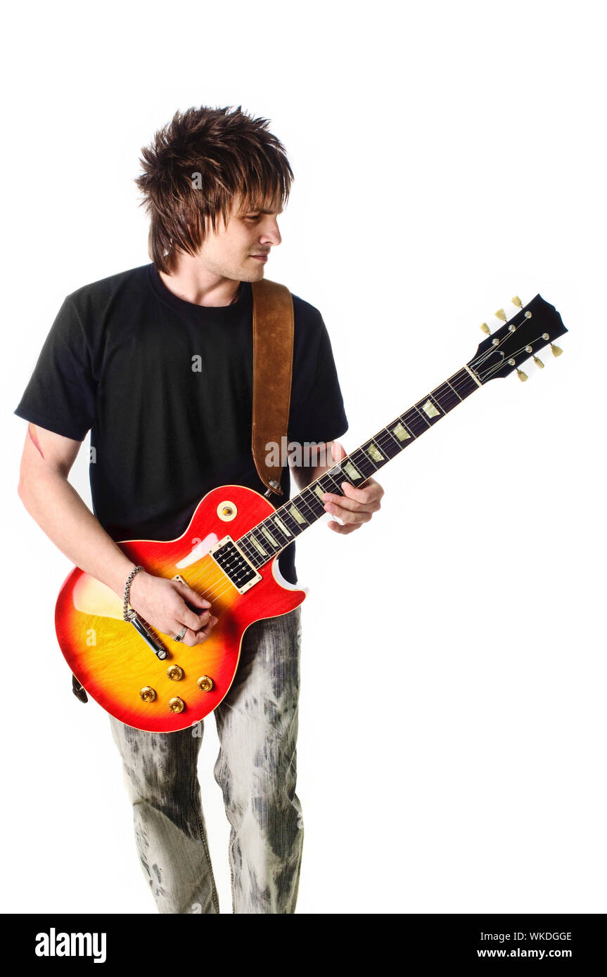 Rocker with his classic acoustic guitar Stock Photo - Alamy