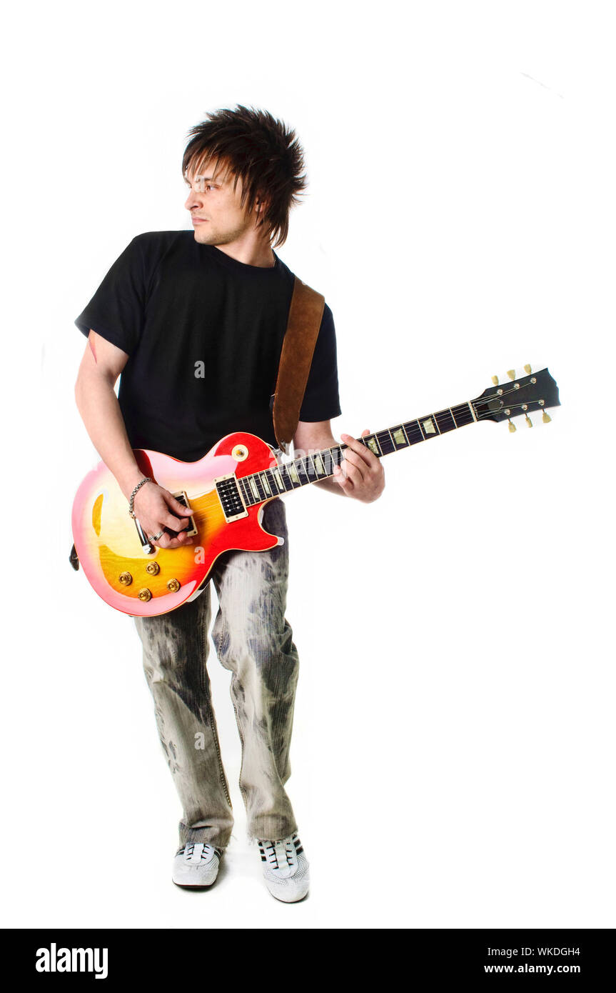 Rocker with his classic electric guitar Stock Photo - Alamy