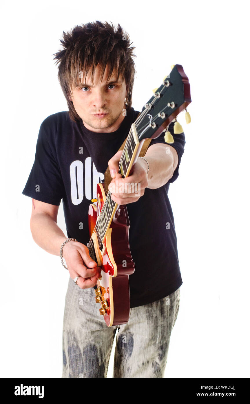 Rocker with his classic electric guitar Stock Photo - Alamy