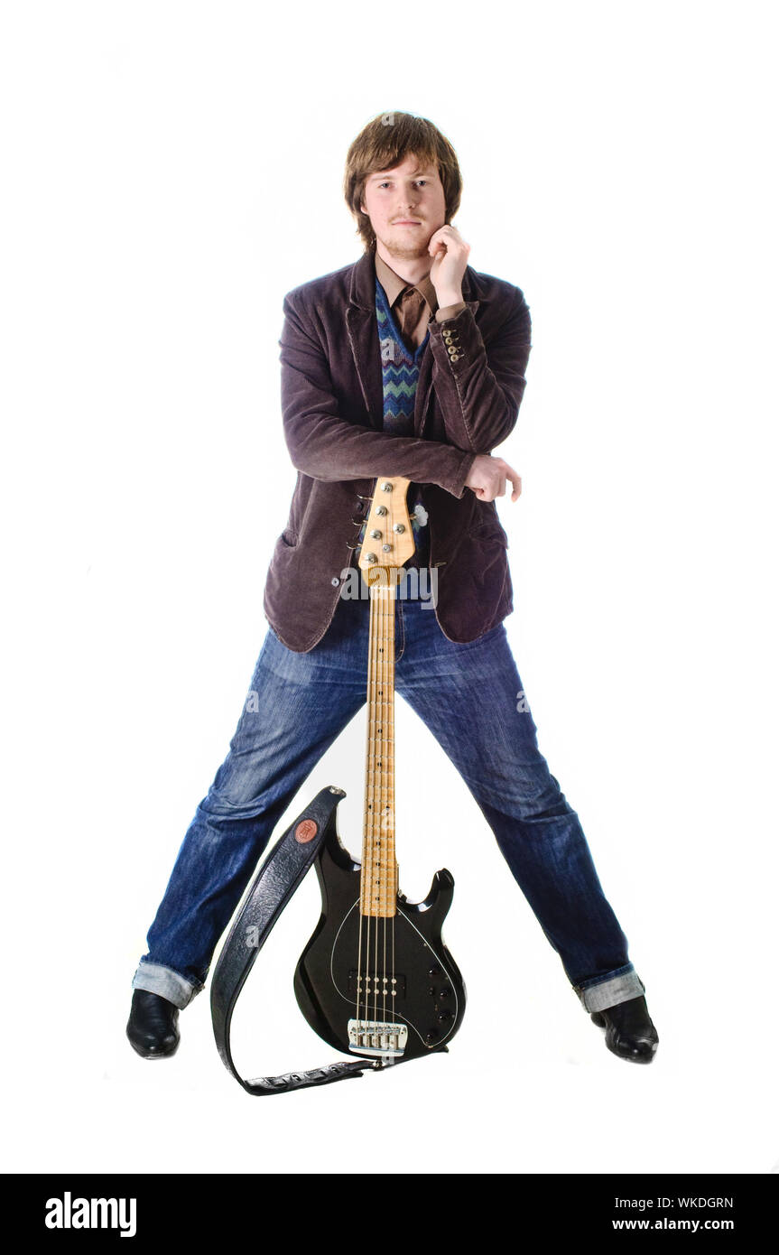 Rocker with his classic electric bass guitar Stock Photo - Alamy