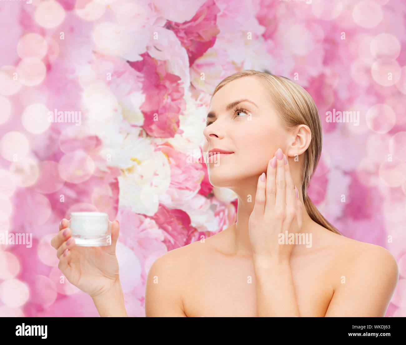 Cosmetics Health And Beauty Concept Beautiful Woman Applying Cream