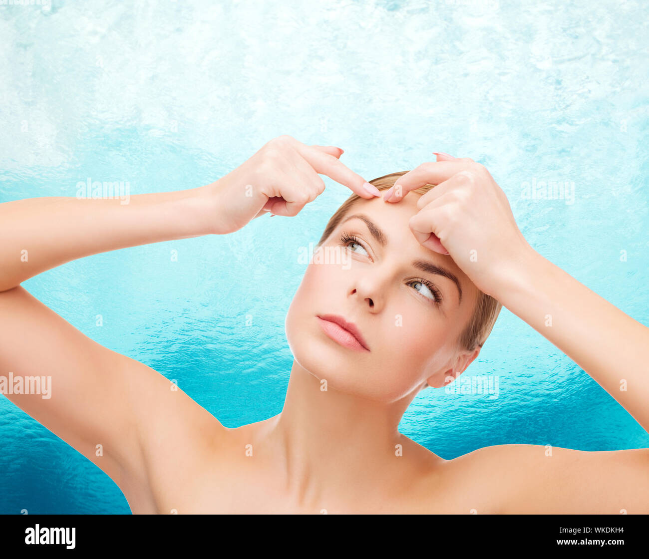 Squeezing spots hi-res stock photography and images - Alamy