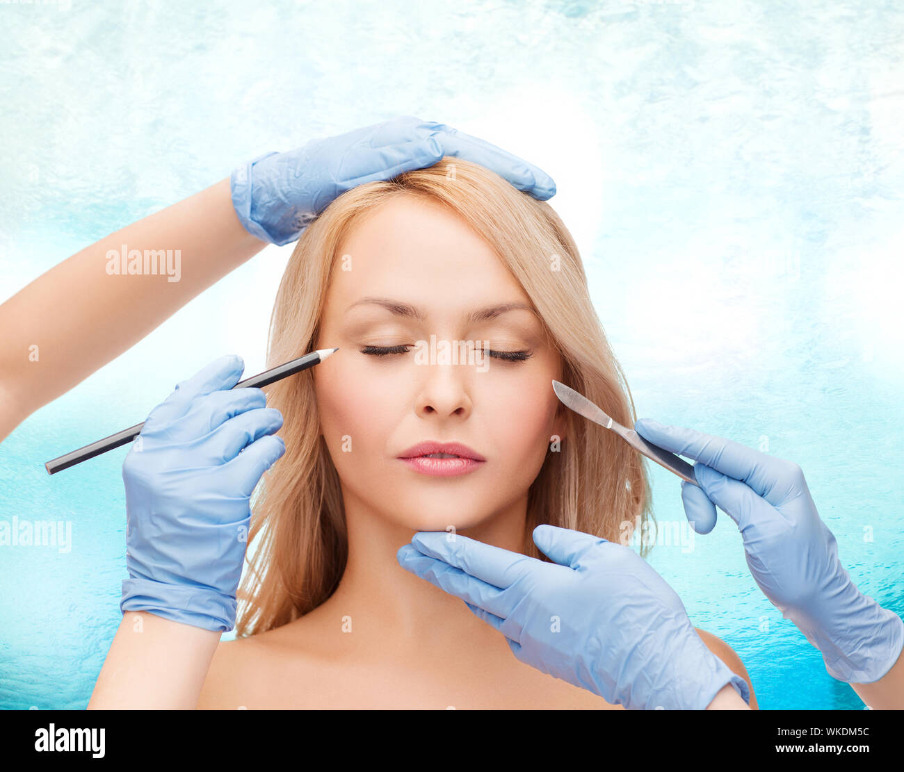 woman and beautician hands with pencil and scalpel Stock Photo - Alamy