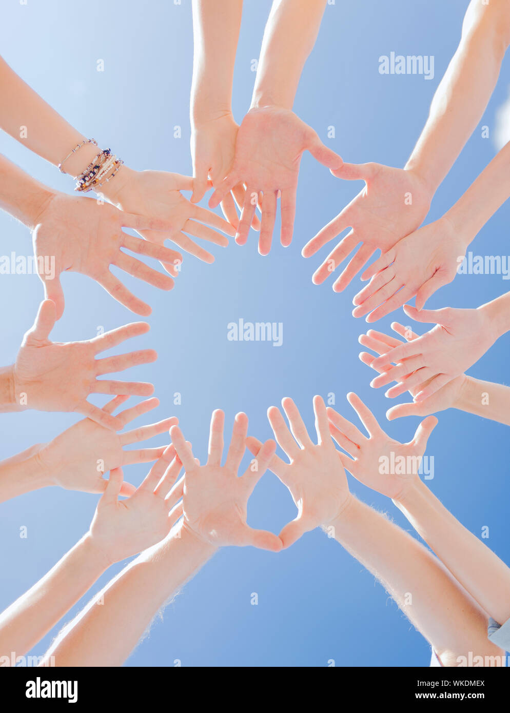 close up of circle of hands Stock Photo - Alamy