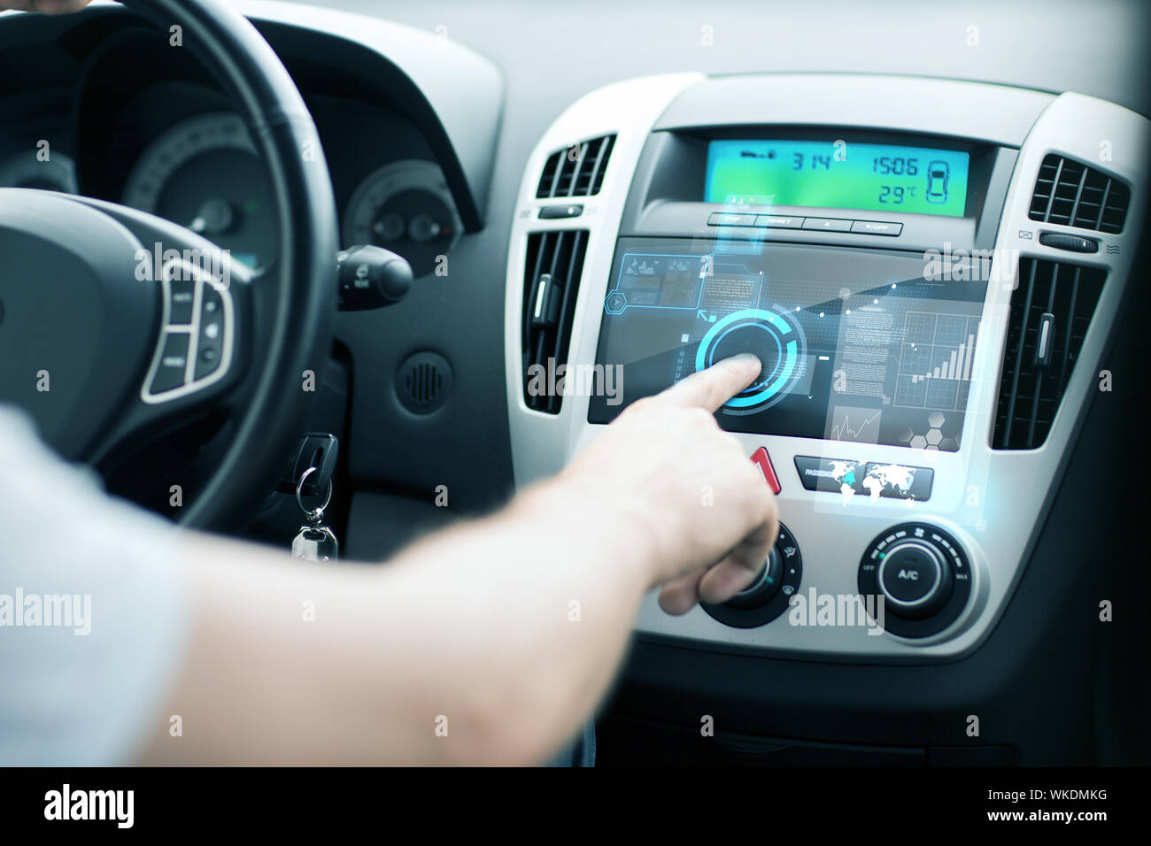 man using car control panel Stock Photo - Alamy
