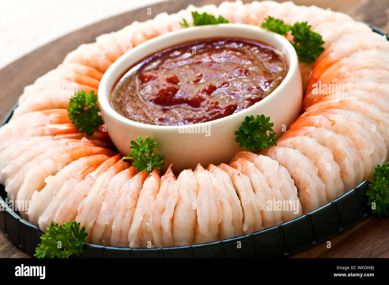 Shrimp ring appetizer platter with dipping sauce Stock Photo - Alamy