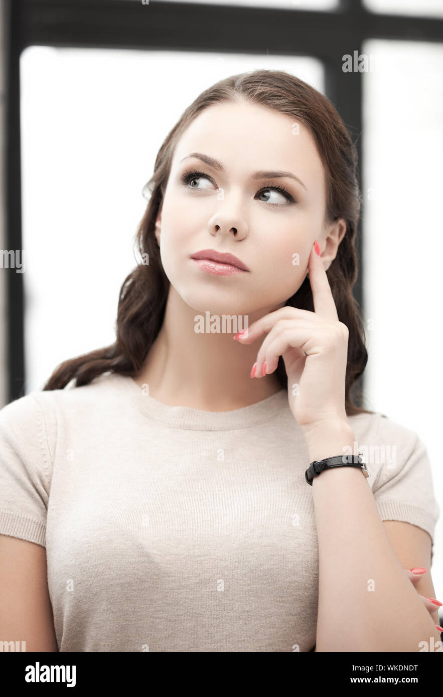 calm and serious thinking woman Stock Photo - Alamy