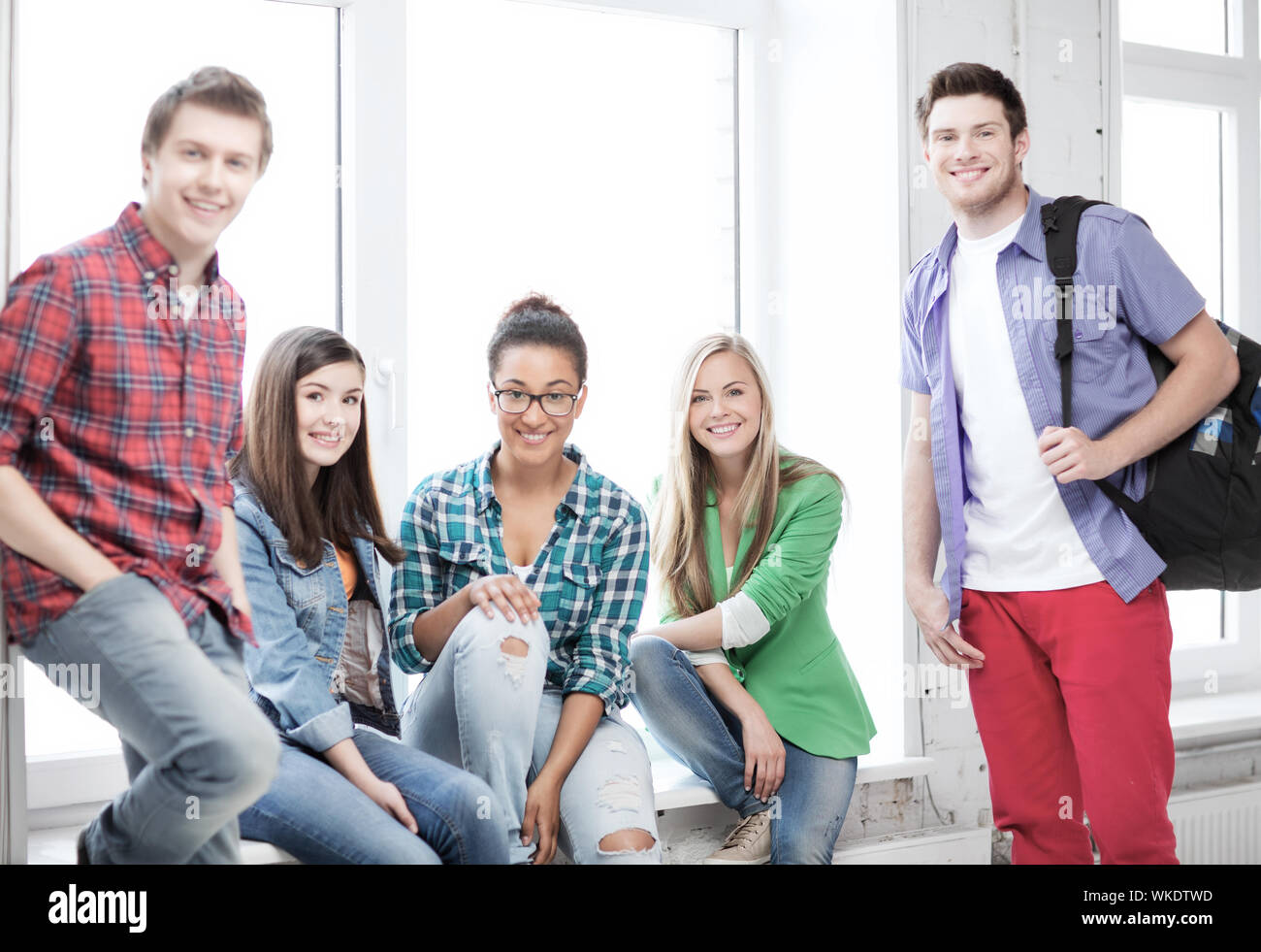 education concept - group of students at school Stock Photo - Alamy