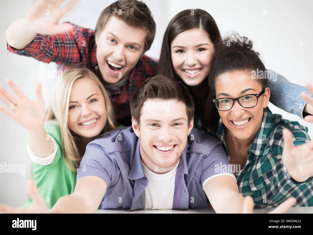 education concept - group of students at school Stock Photo - Alamy