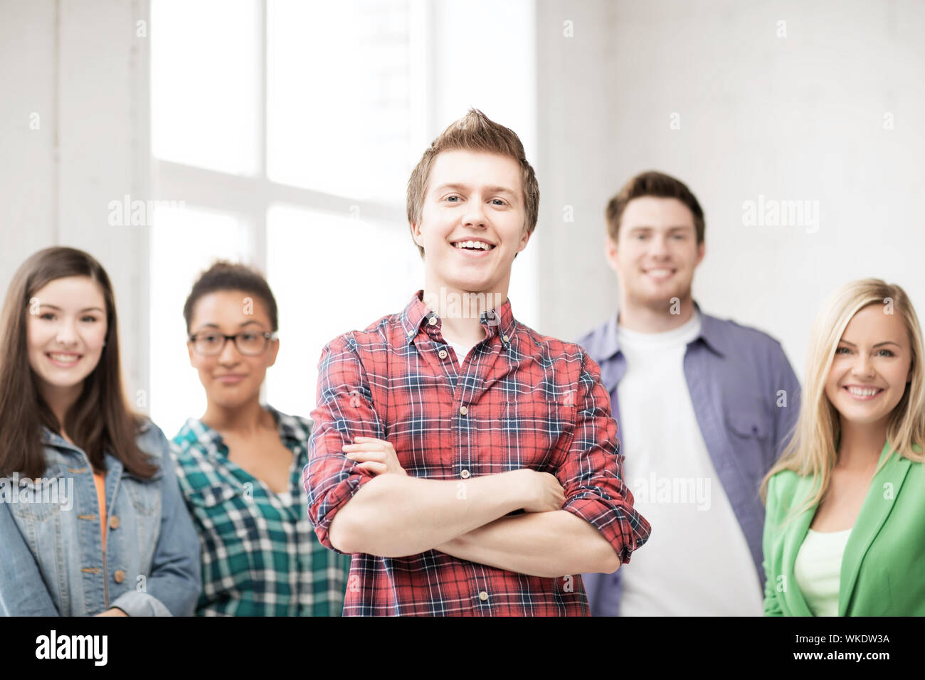education concept - group of students at school Stock Photo - Alamy