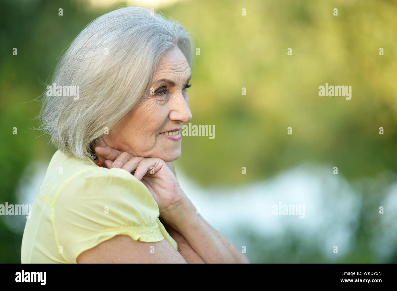 portrait of happy smiling senior beautiful woman Stock Photo - Alamy