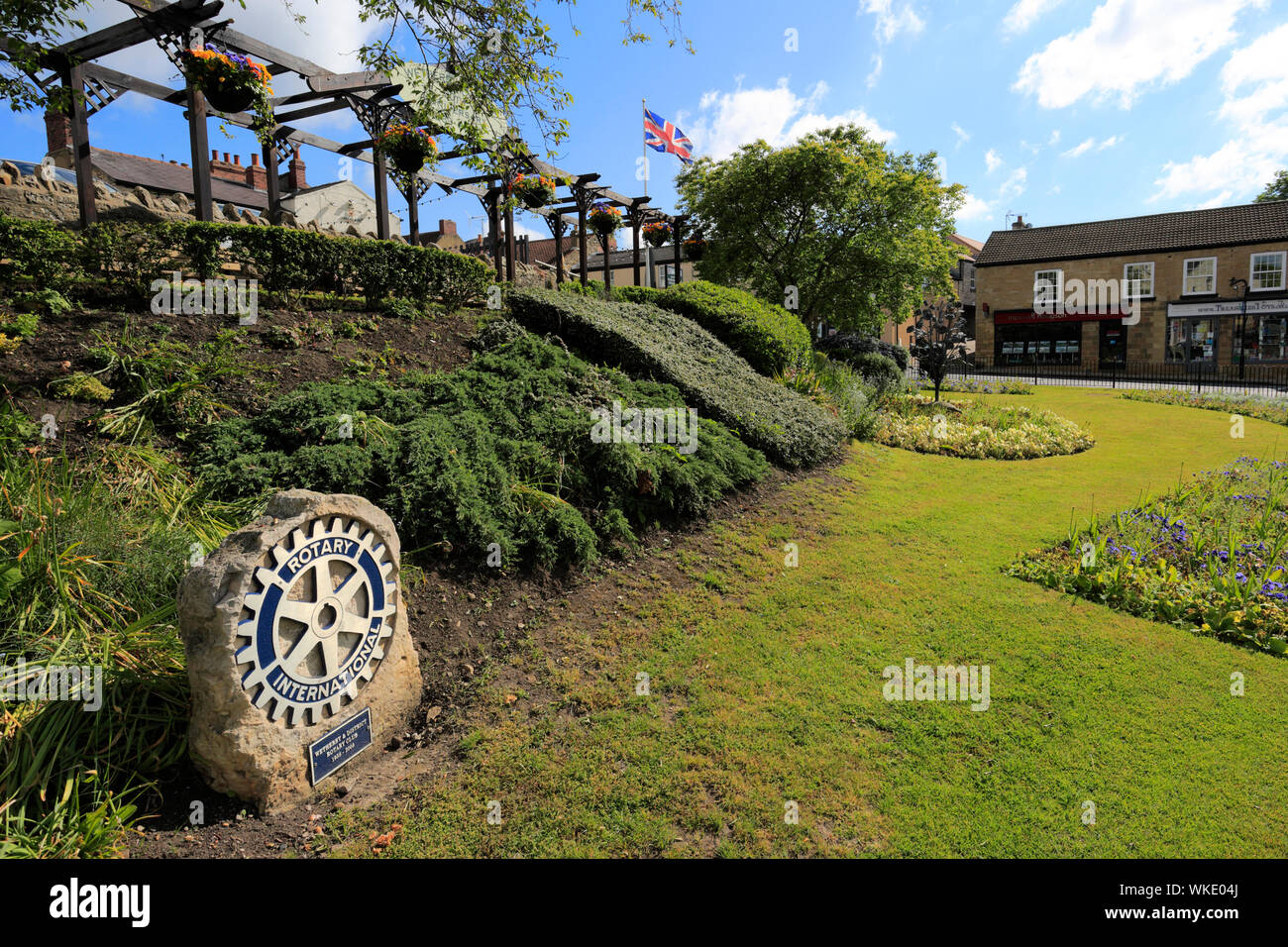 The Rotary International wheel, Red Lion Gardens, Wetherby town, North ...
