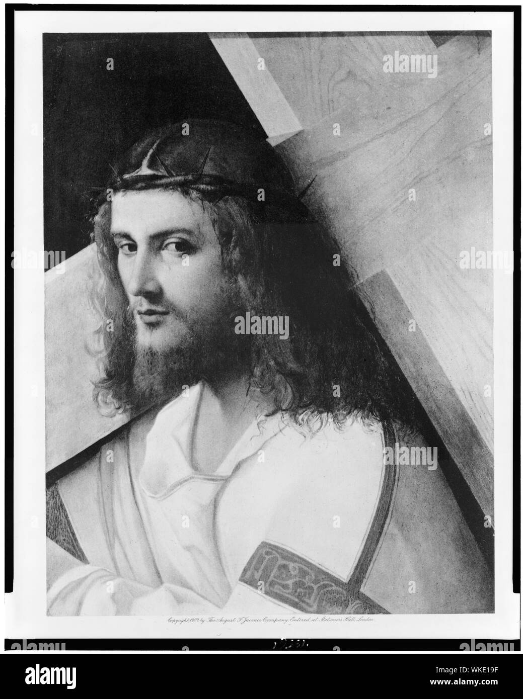 Jesus Christ with cross Stock Photo - Alamy