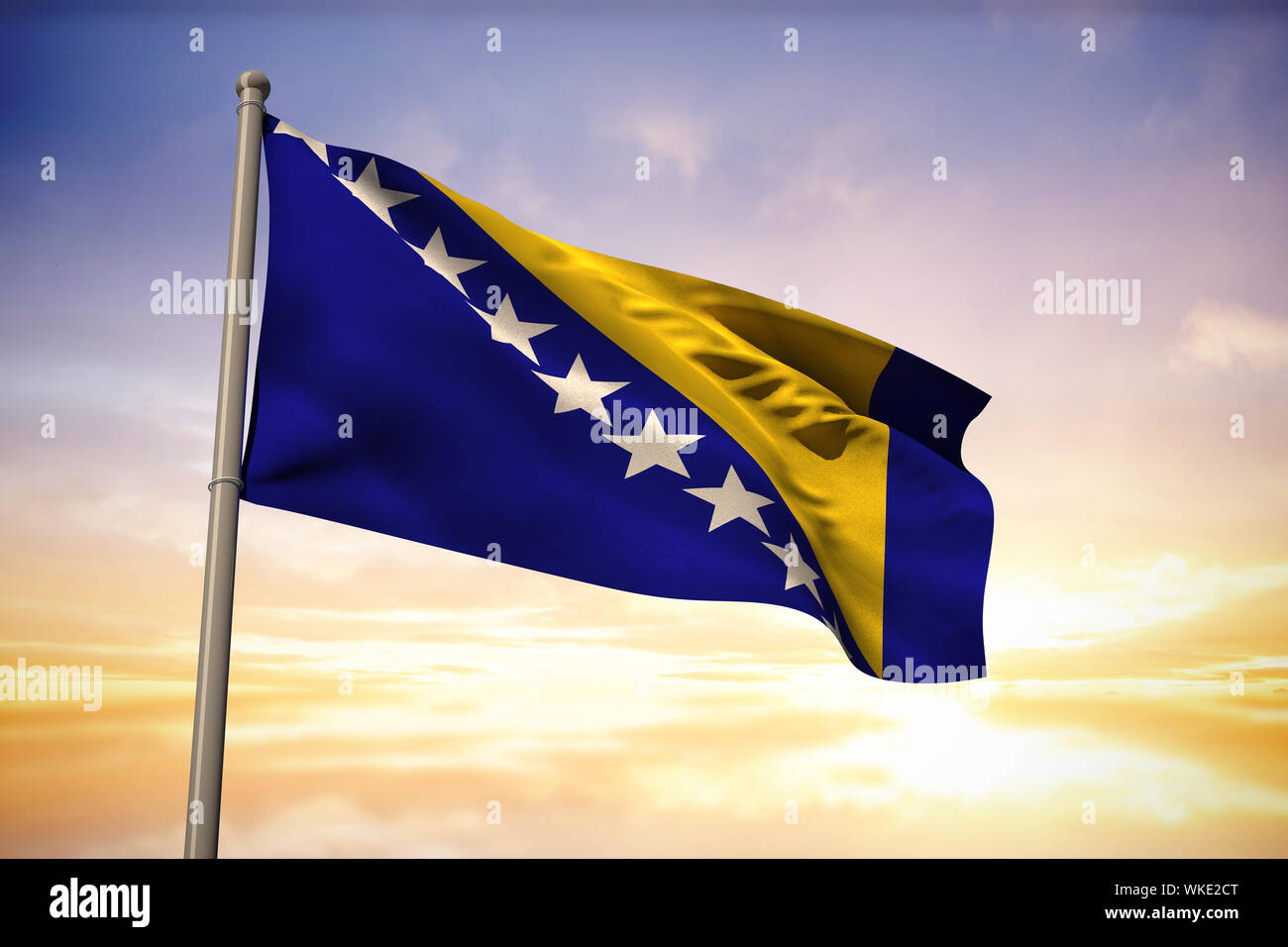 Bosnia national flag against beautiful blue and yellow sky Stock Photo ...