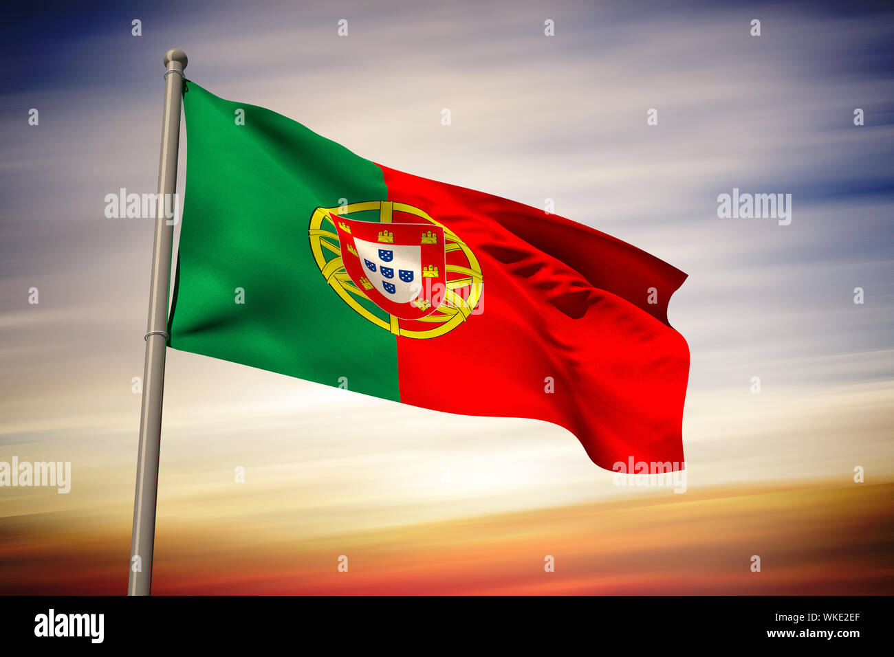 Portugal national flag against blue cloudy sky Stock Photo - Alamy