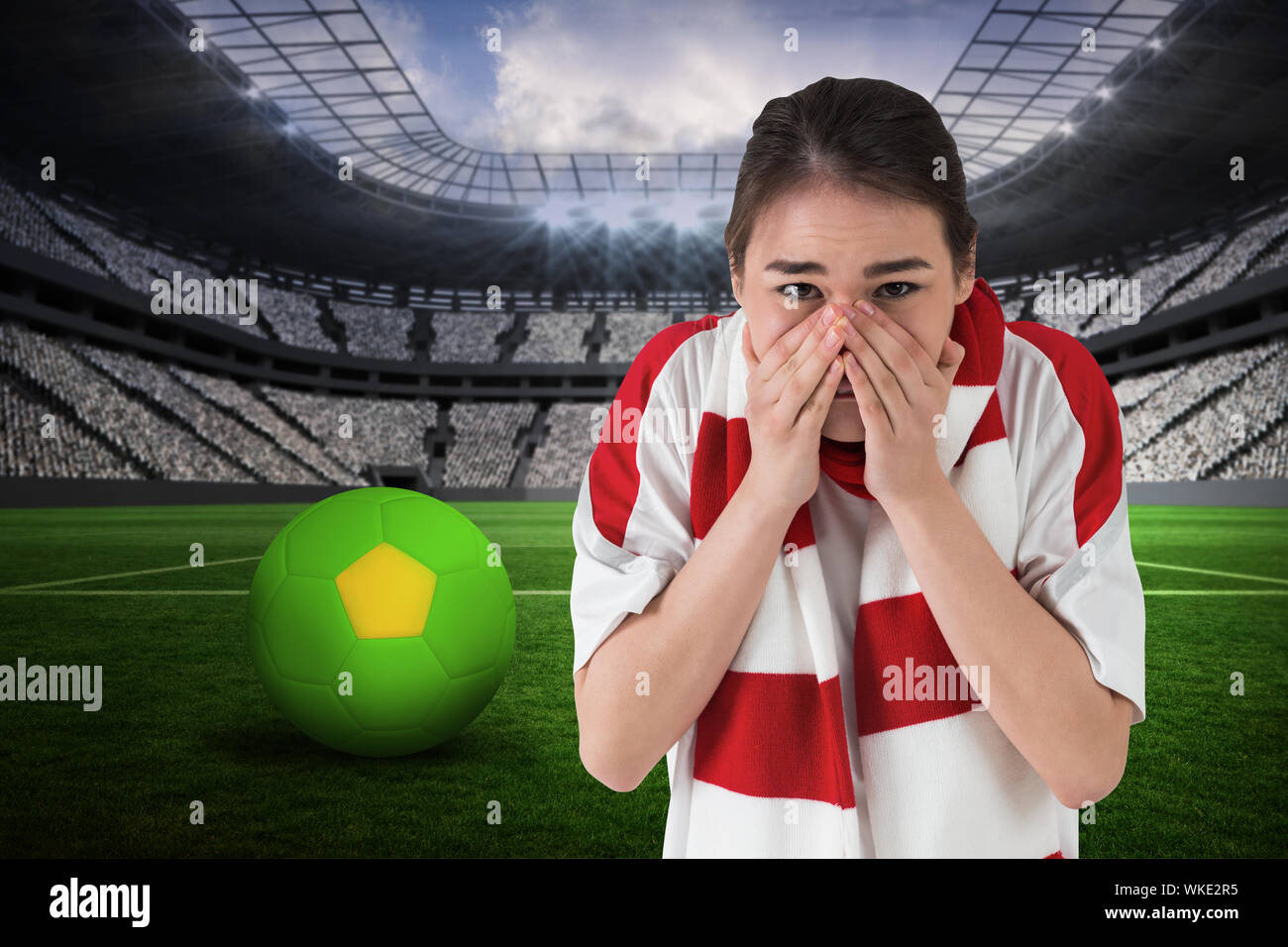 Nervous football fan looking ahead against vast football stadium with ...