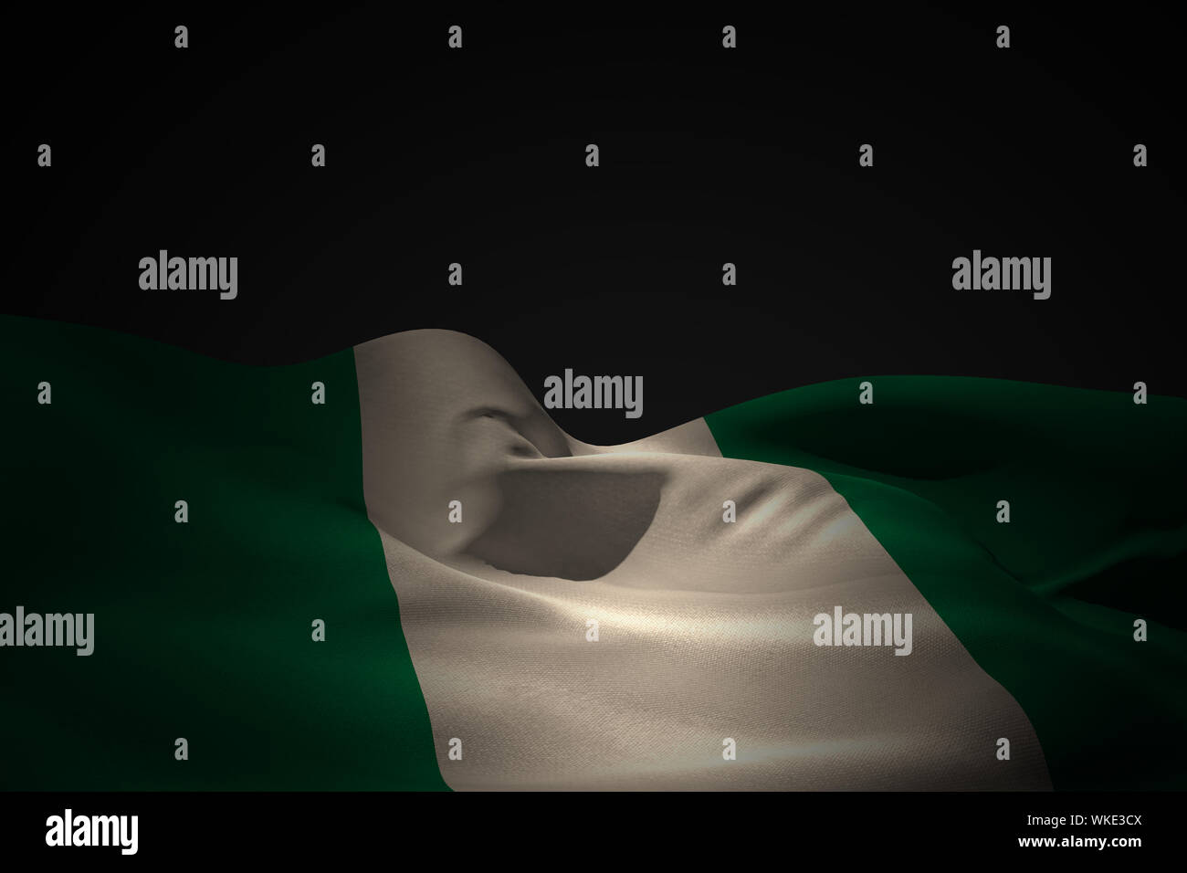 Nigeria flag waving against black shadow Stock Photo - Alamy