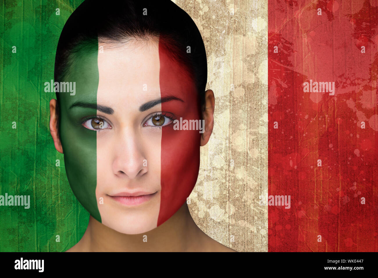 Composite image of beautiful football fan in face paint against italy ...