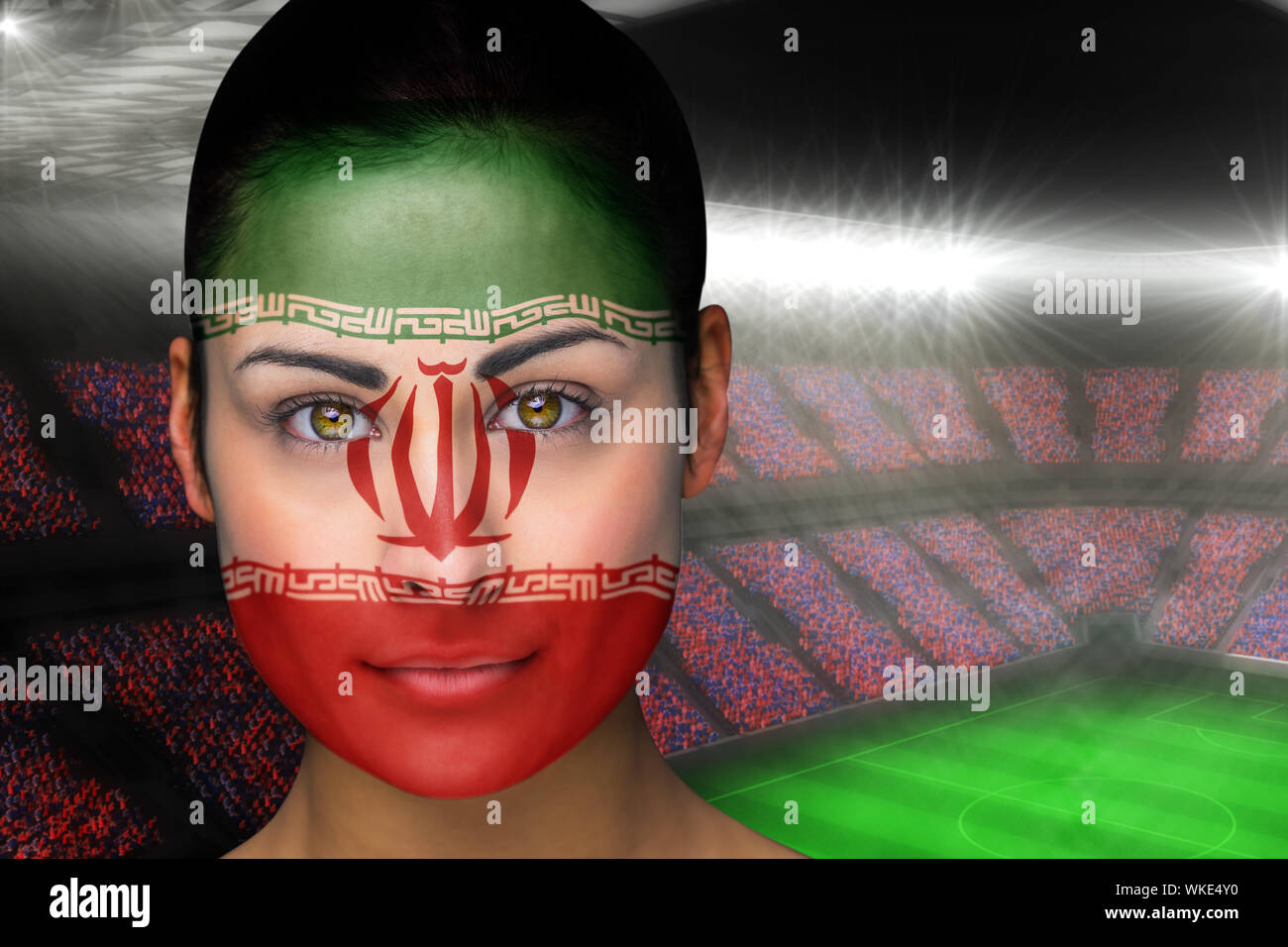 Composite image of beautiful iran fan in face paint against large ...
