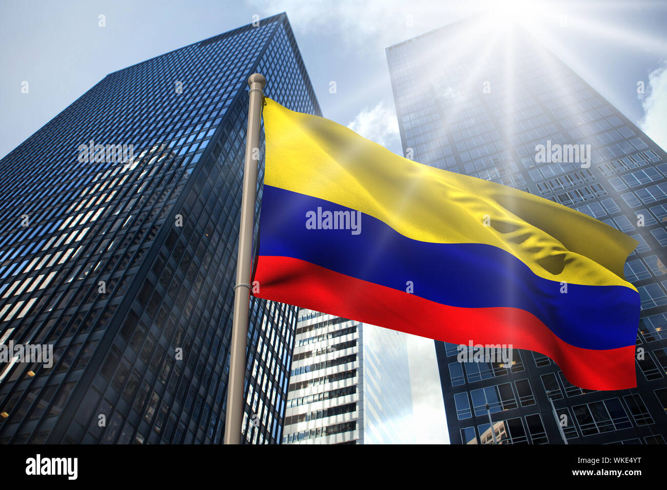 Colombia national flag against low angle view of skyscrapers Stock ...